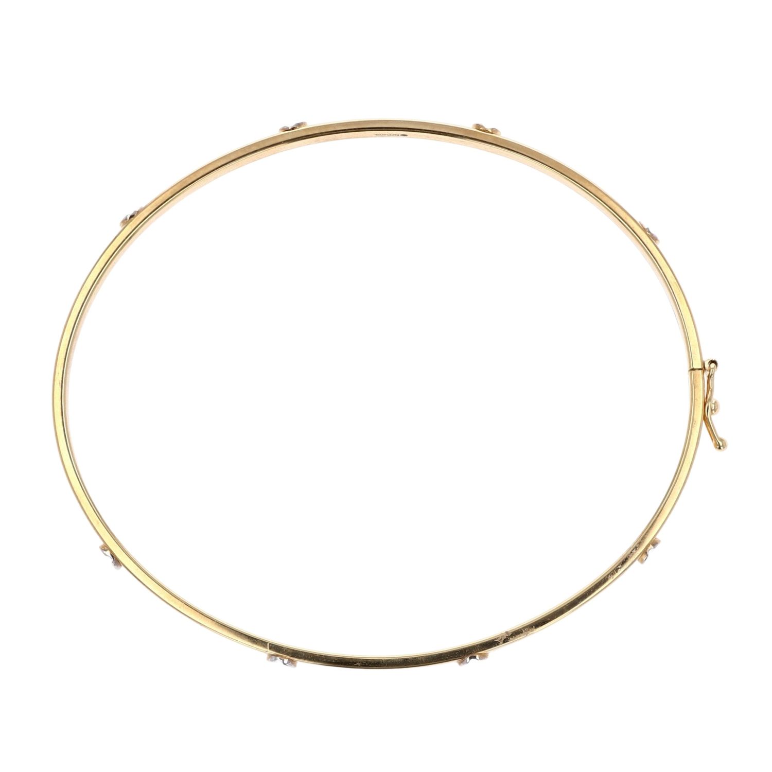 9ct Yellow and White Plain Screw Bangle RAMS4440001476 | Ramsdens Jewellery